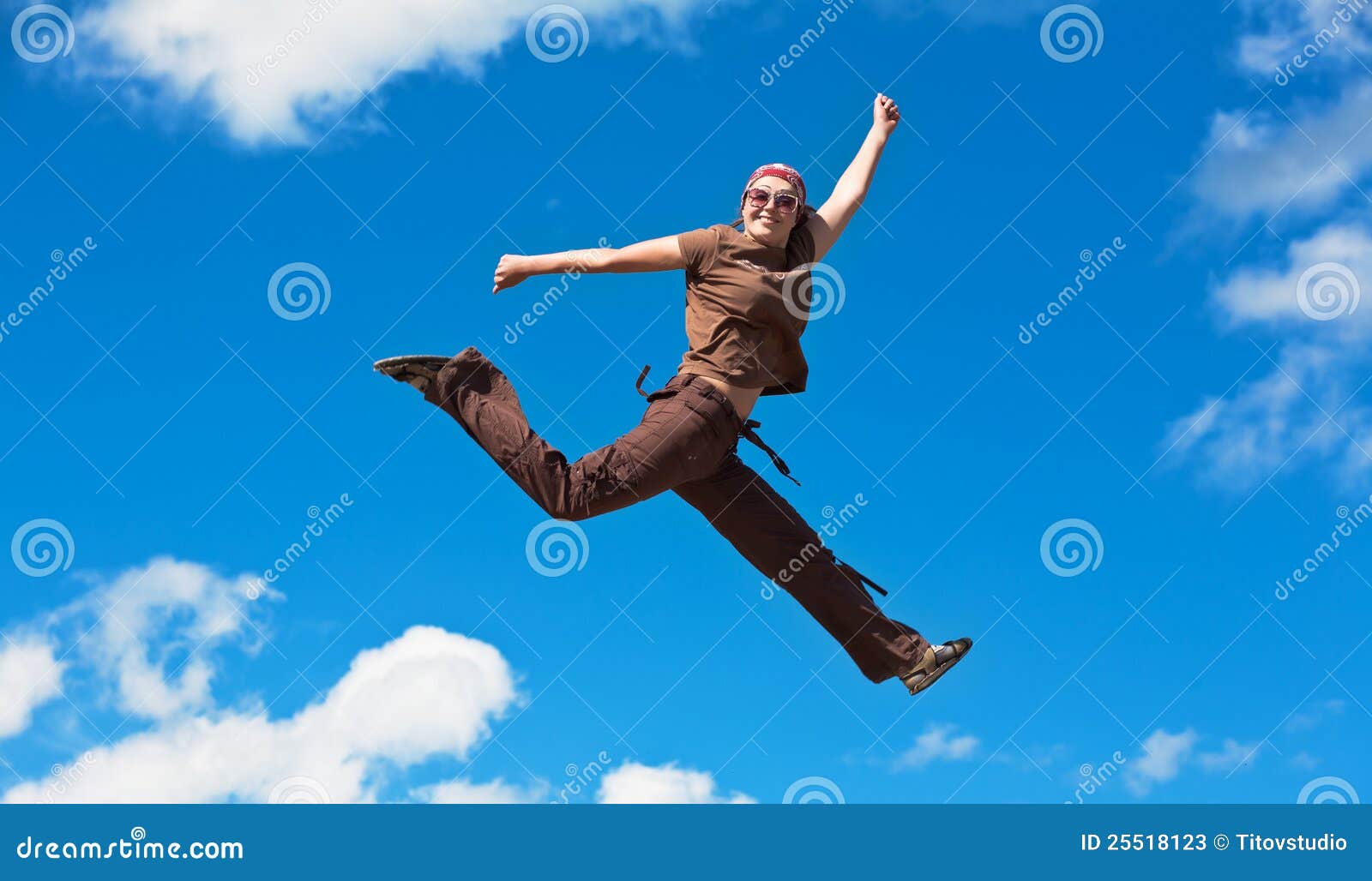 Jumping Girl with Hands Up Against Stock Image - Image of girl, females ...