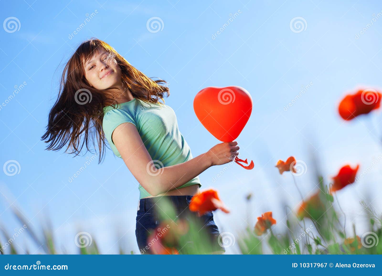 Jumping girl with heart stock image. Image of expression - 10317967