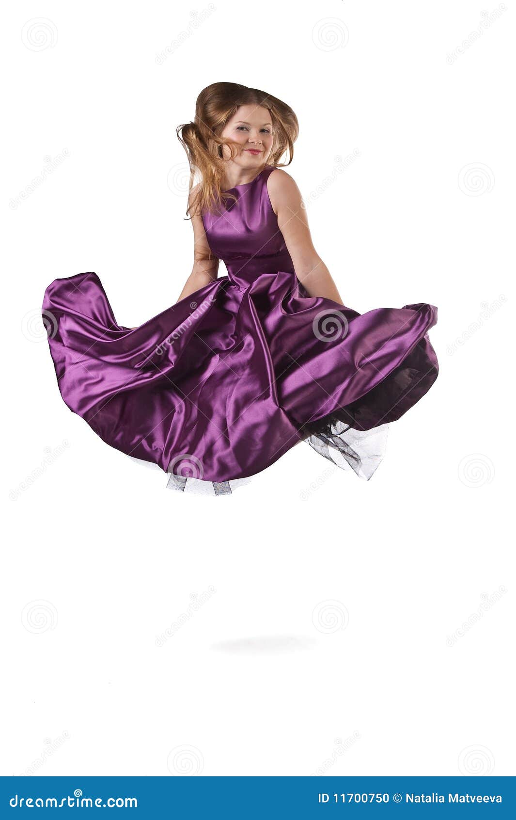 Woman Jumping In Dress
