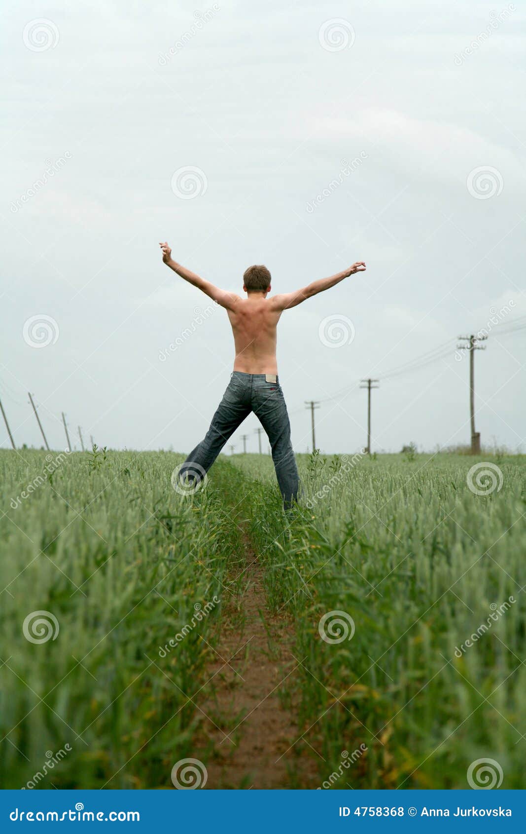 Jumping in green field stock photo. Image of joyful, arms - 4758368