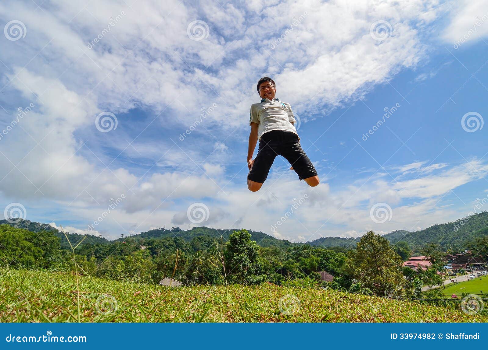 Jumping happy young man stock photo. Image of success - 33974982