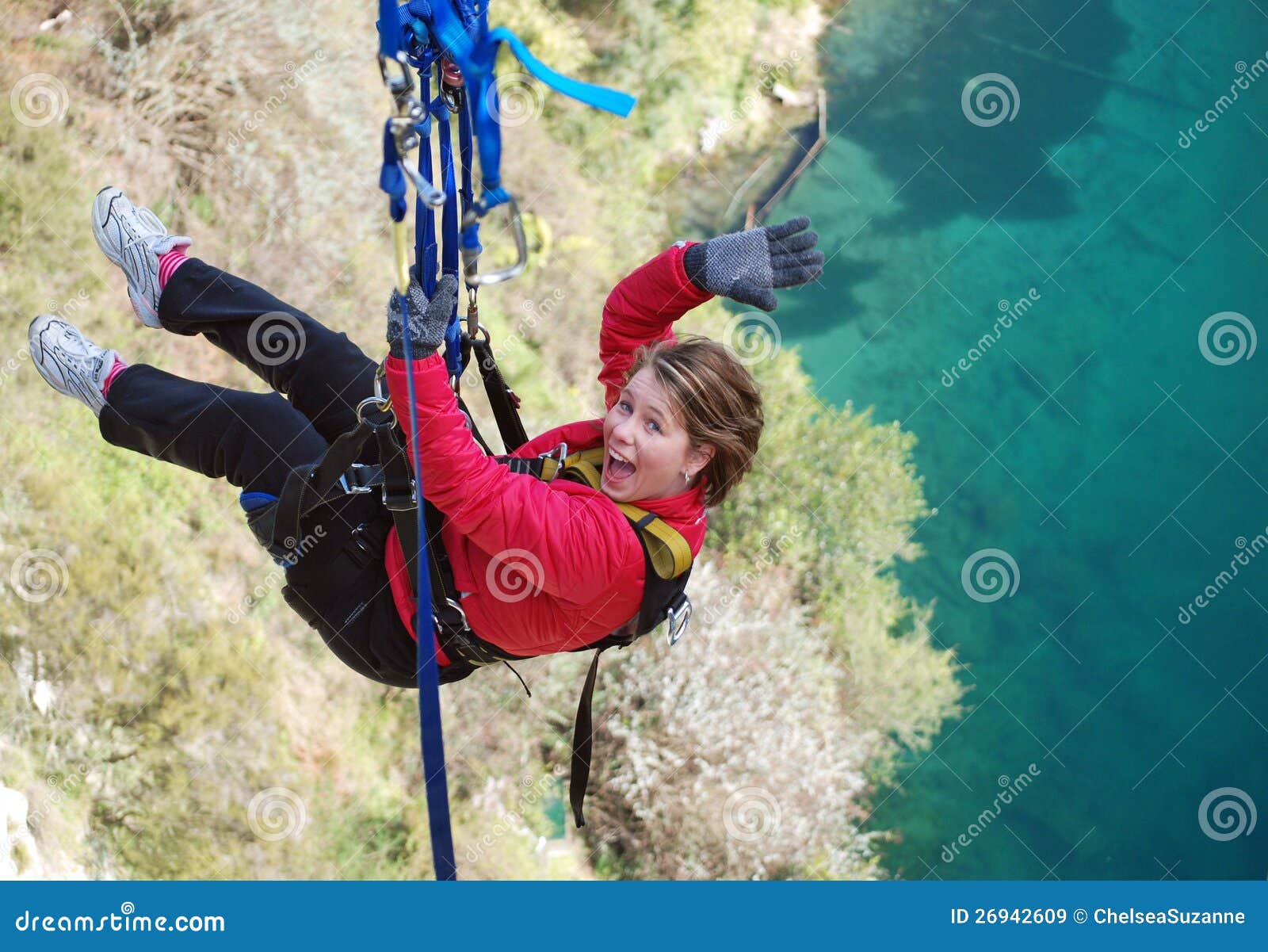 Jumping from High Off Cliff Over Lake Bungee Style Stock Image - Image ...