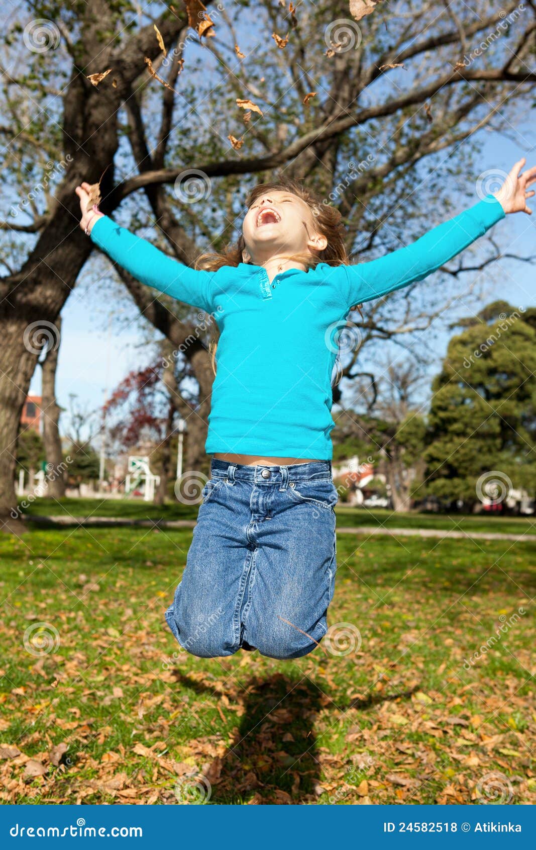 Jumping for joy stock photo. Image of smiling, adorable - 24582518