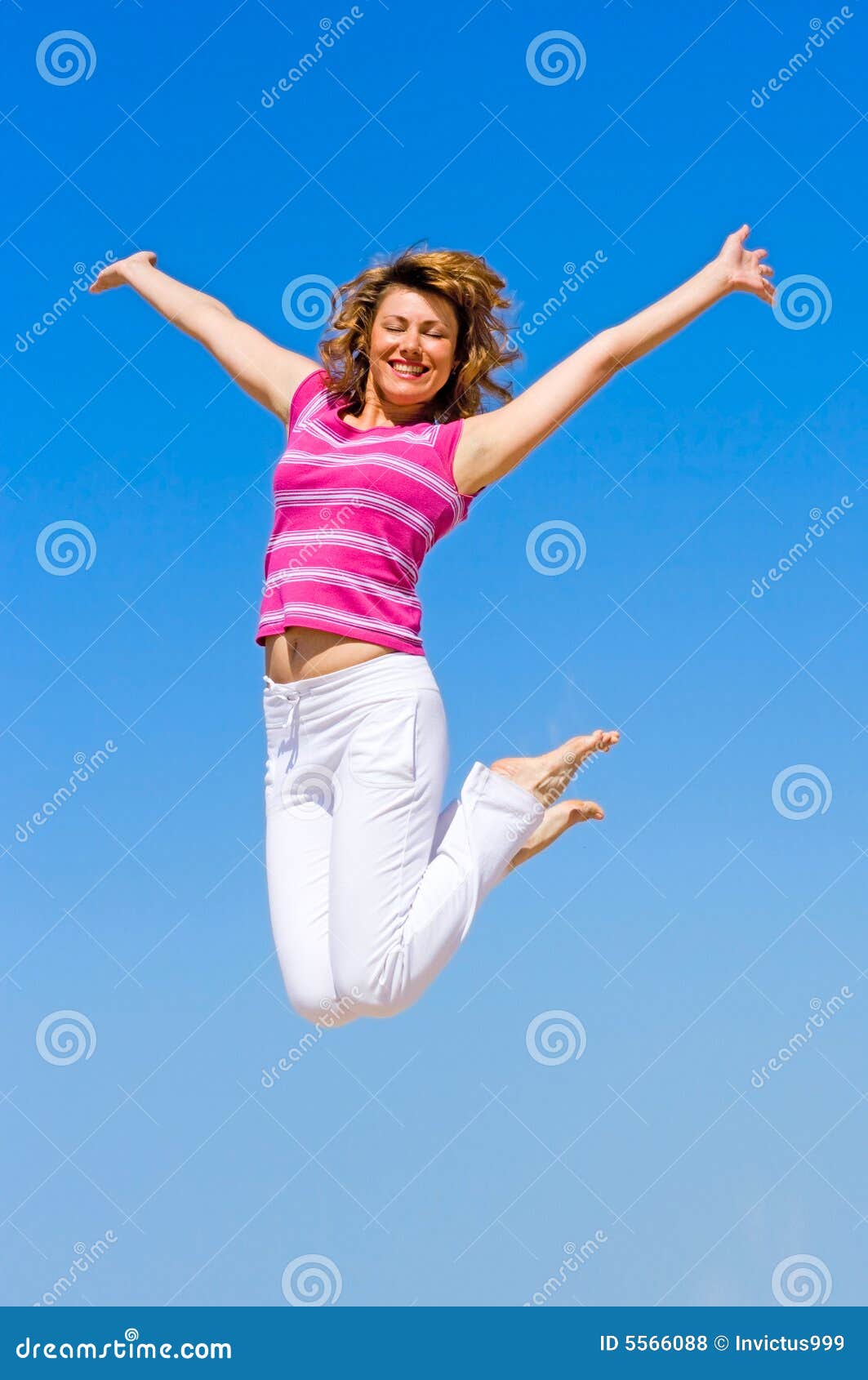 Jumping in joy stock photo. Image of smile, enjoyment - 5566088