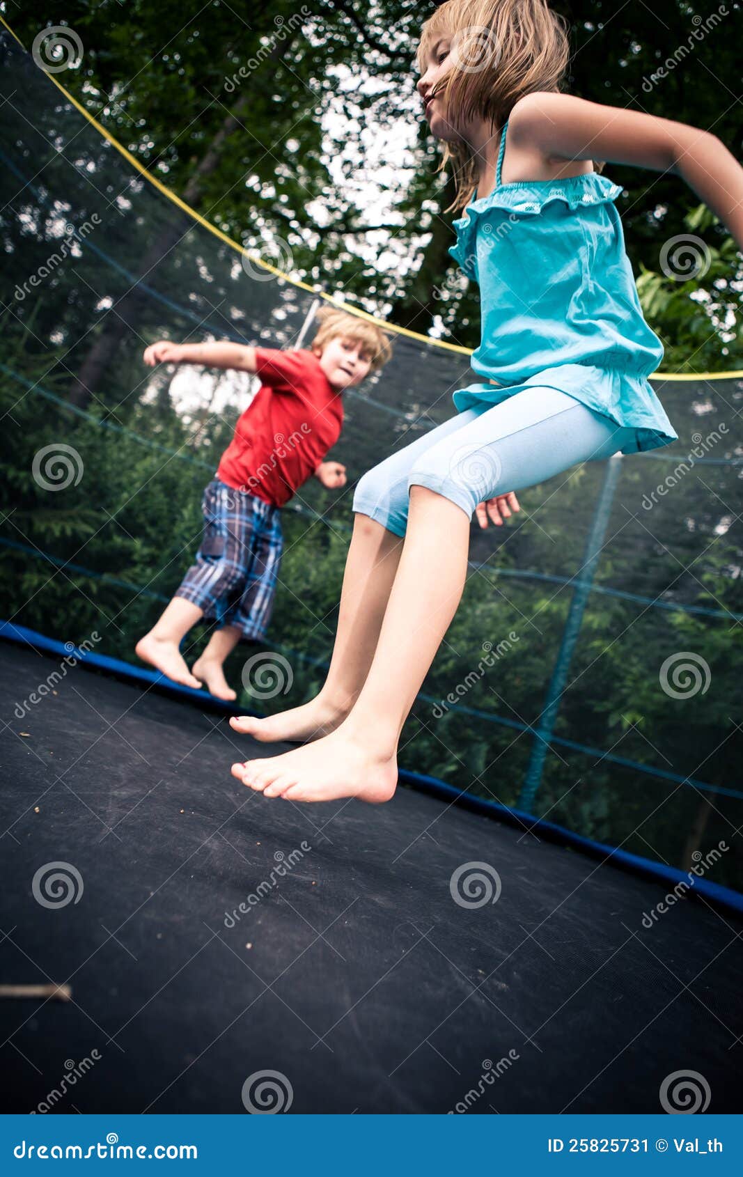 Jumping kids stock image. Image of female, child, yard - 25825731
