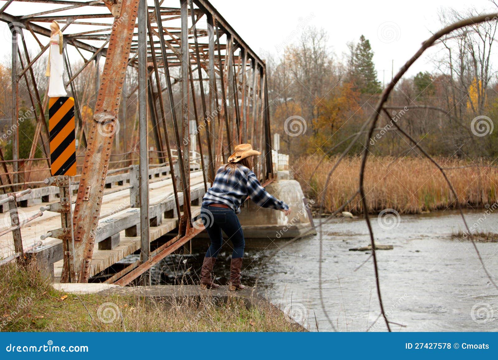 Jumping off a bridge stock photo. Image of rust, creek - 27427578