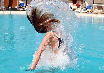 Jumping out of pool stock photo. Image of female, bikini - 13105756