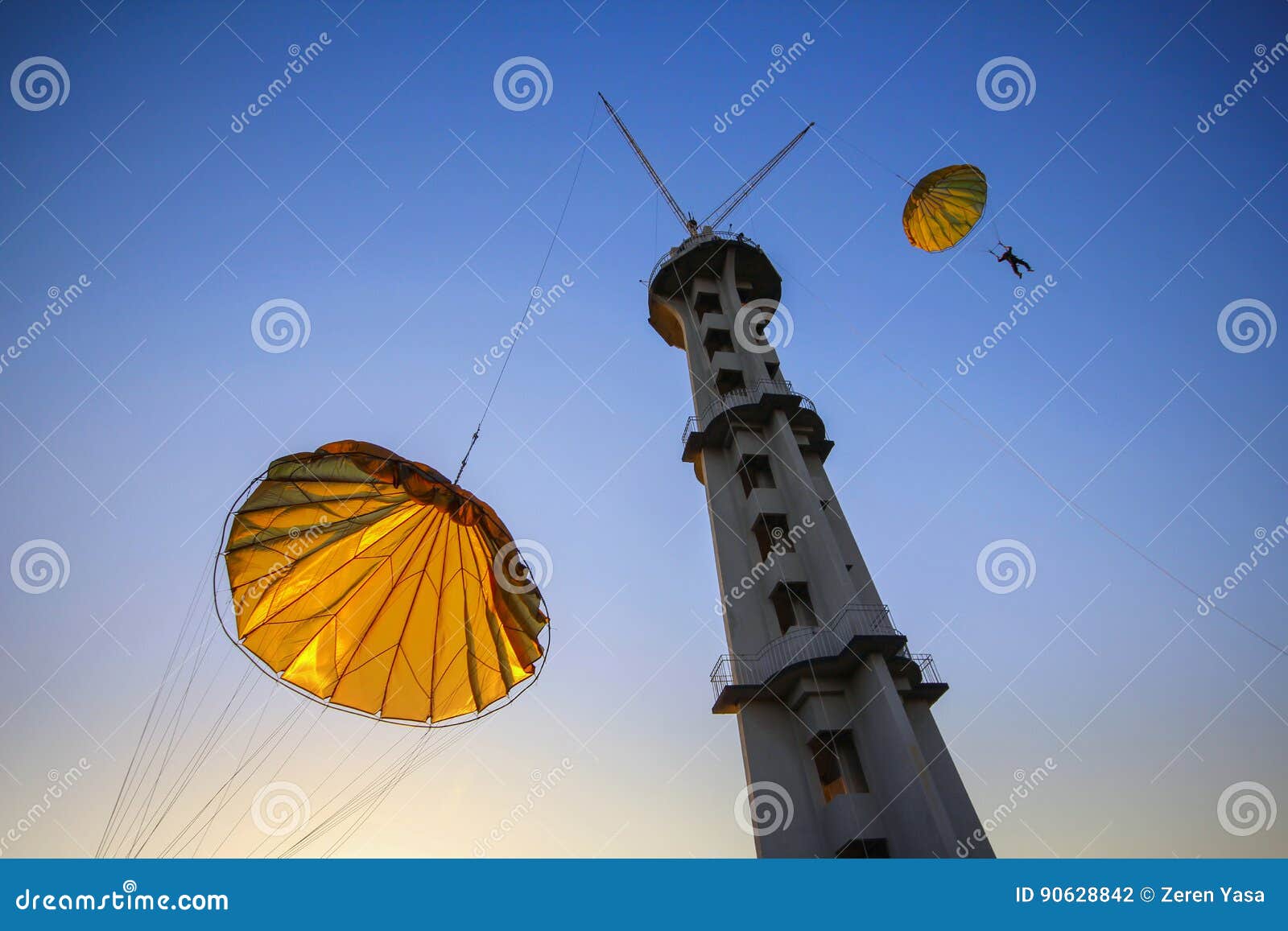 Jumping from a Parachute Tower. Stock Photo - Image of parachute ...