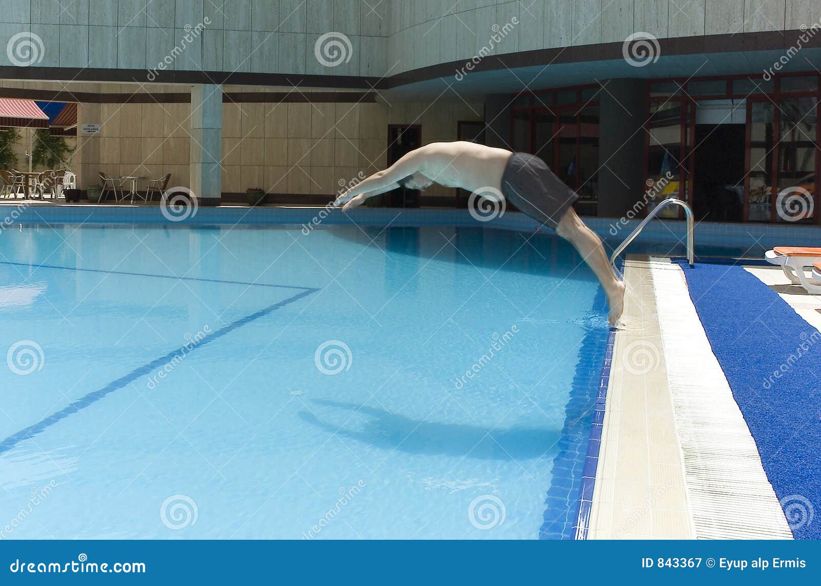 Jumping into the Pool stock image. Image of motel, holiday - 843367