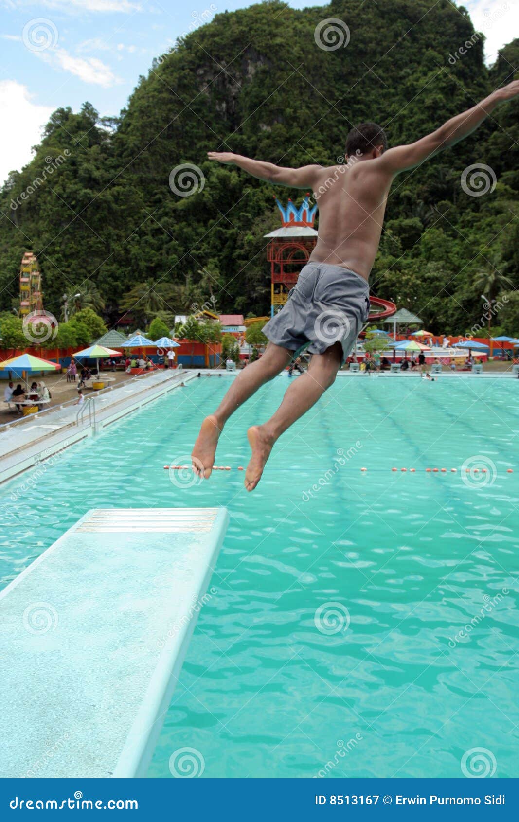 Jumping in the pool stock image. Image of motion, mountain - 8513167