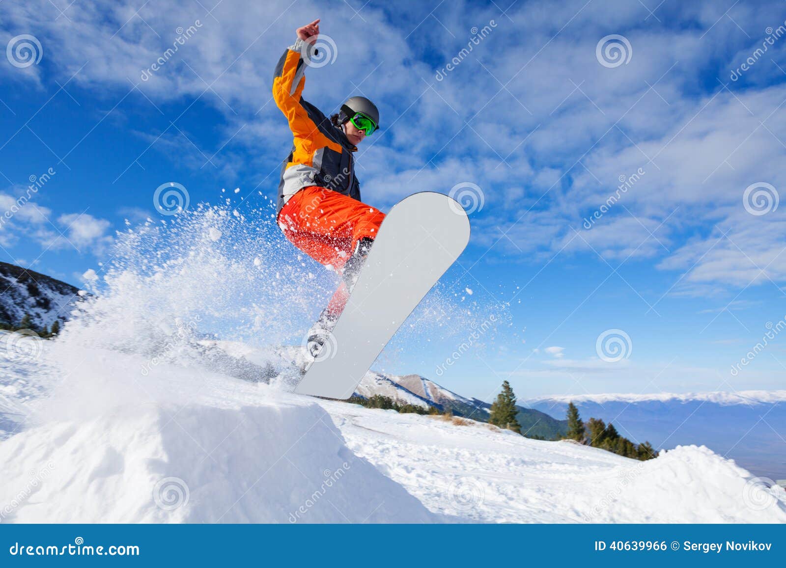 Jumping Snowboarder from Hill in Winter Stock Photo - Image of male ...