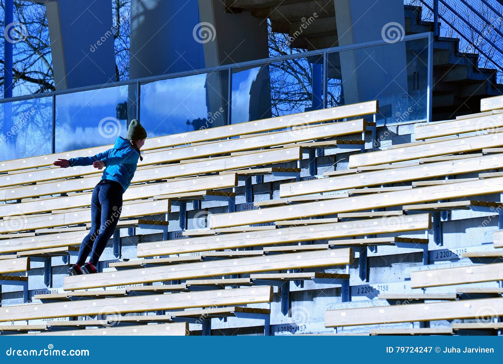 Jumping on stadium stairs. stock image. Image of athlete - 79724247
