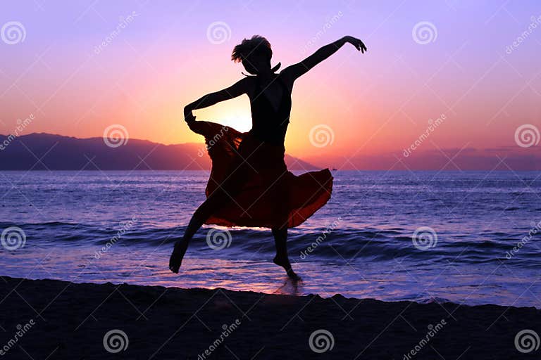 Jumping at sunset stock image. Image of dramatic, dusk - 1592141