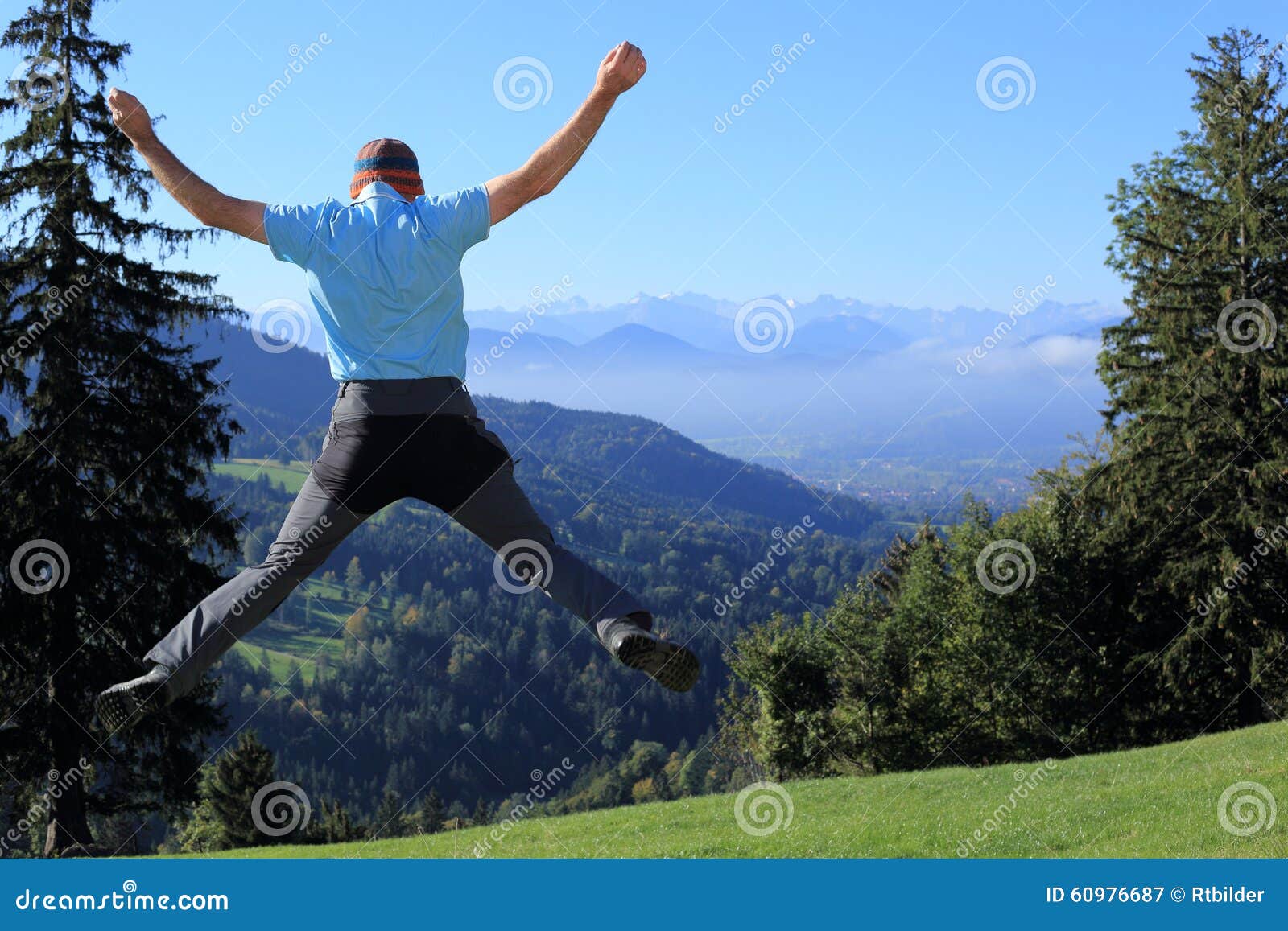Jumping up man stock image. Image of countryside, green - 60976687
