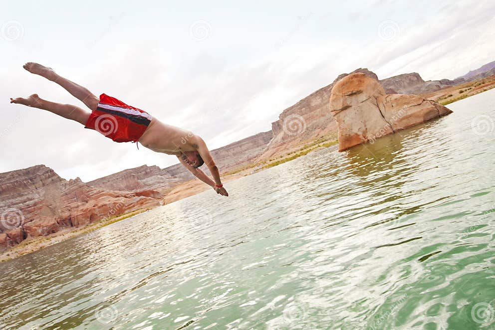 Jumping in the Water and Playing in the Lake Stock Photo - Image of ...