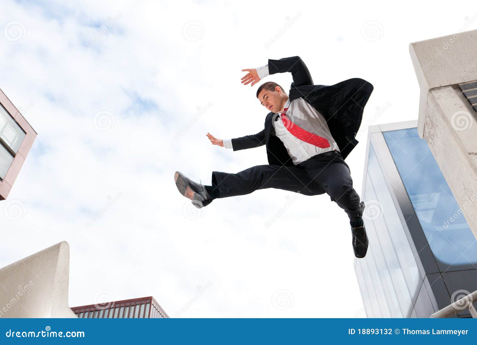 Jumping young business man stock photo. Image of business - 18893132