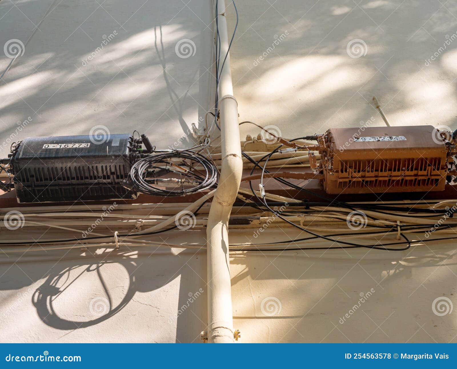Junction Boxes of Electrical and Internet Cables on a Houses Wall Stock ...