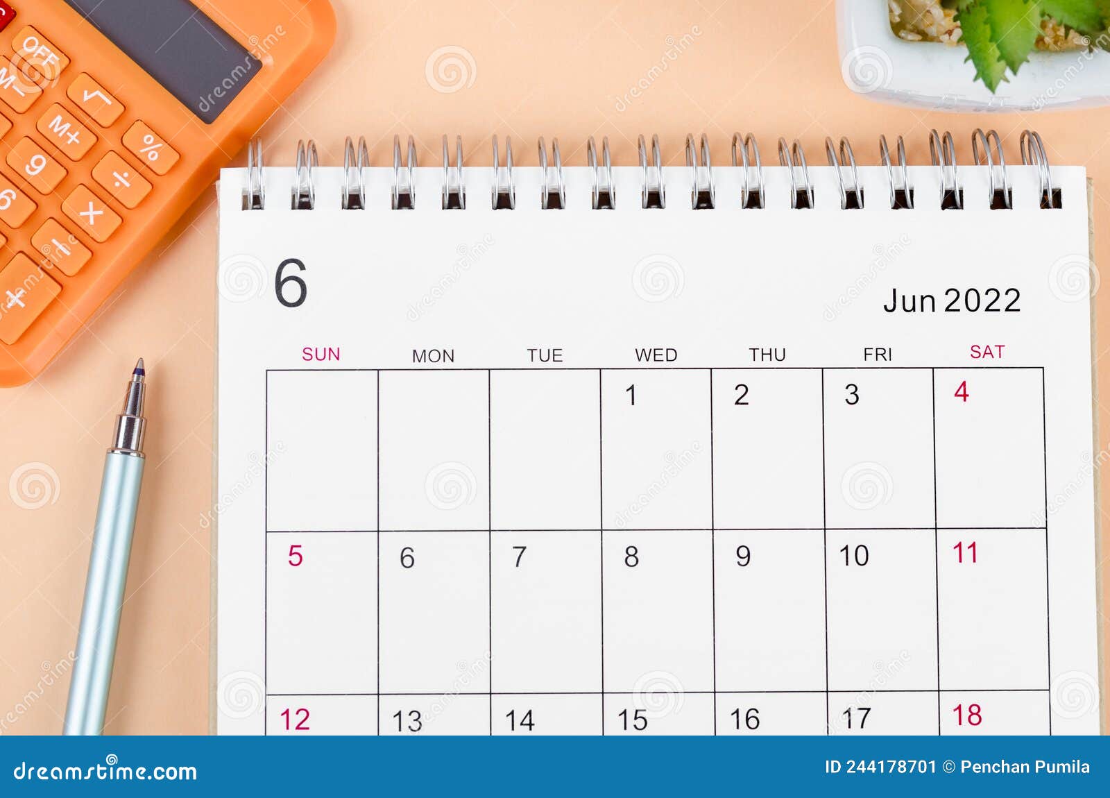 June 2022 Desk Calendar with Calculator on Beautiful Background Stock ...