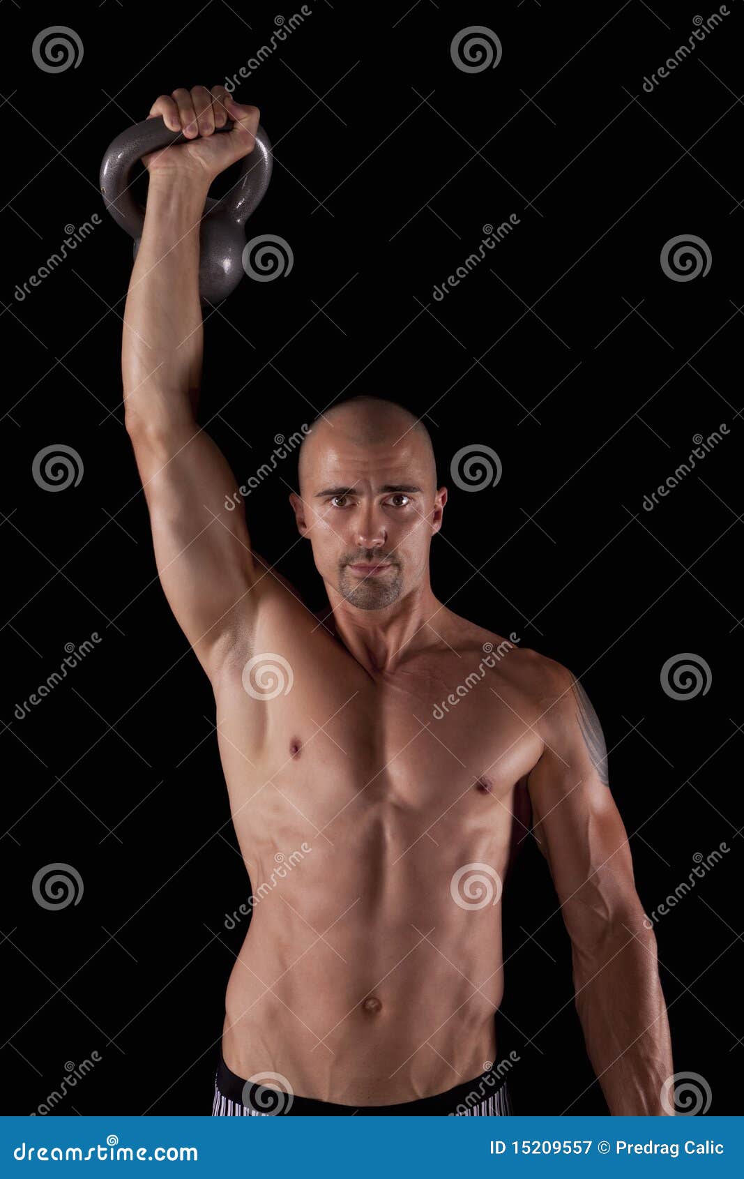 Junger Mann Des Muskels Mit Kettlebells Stockbild - Bild von schön ...