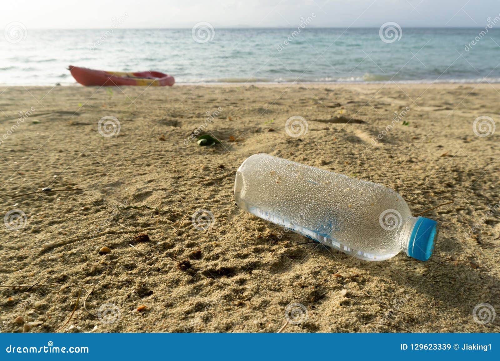 Junk Bottle on Sand Beach in Sunset Time Stock Image - Image of sand ...