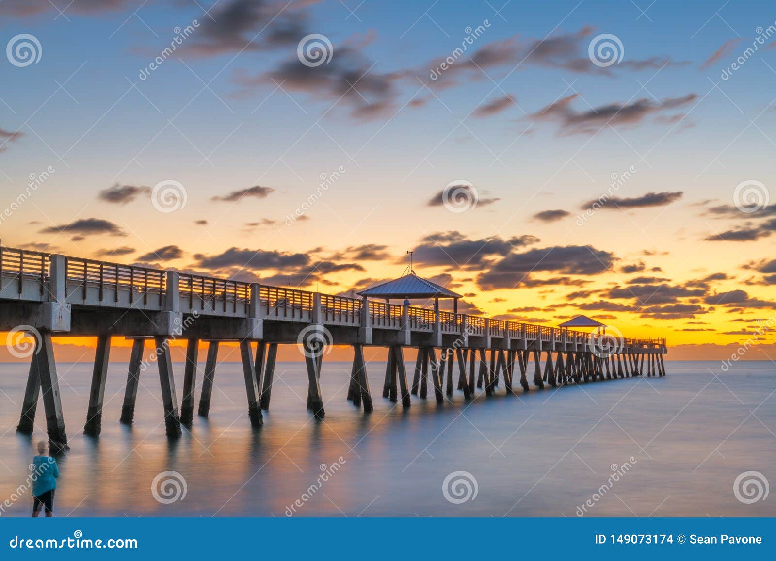 Juno Beach Pier stock photo. Image of jetty, sunset - 149073174