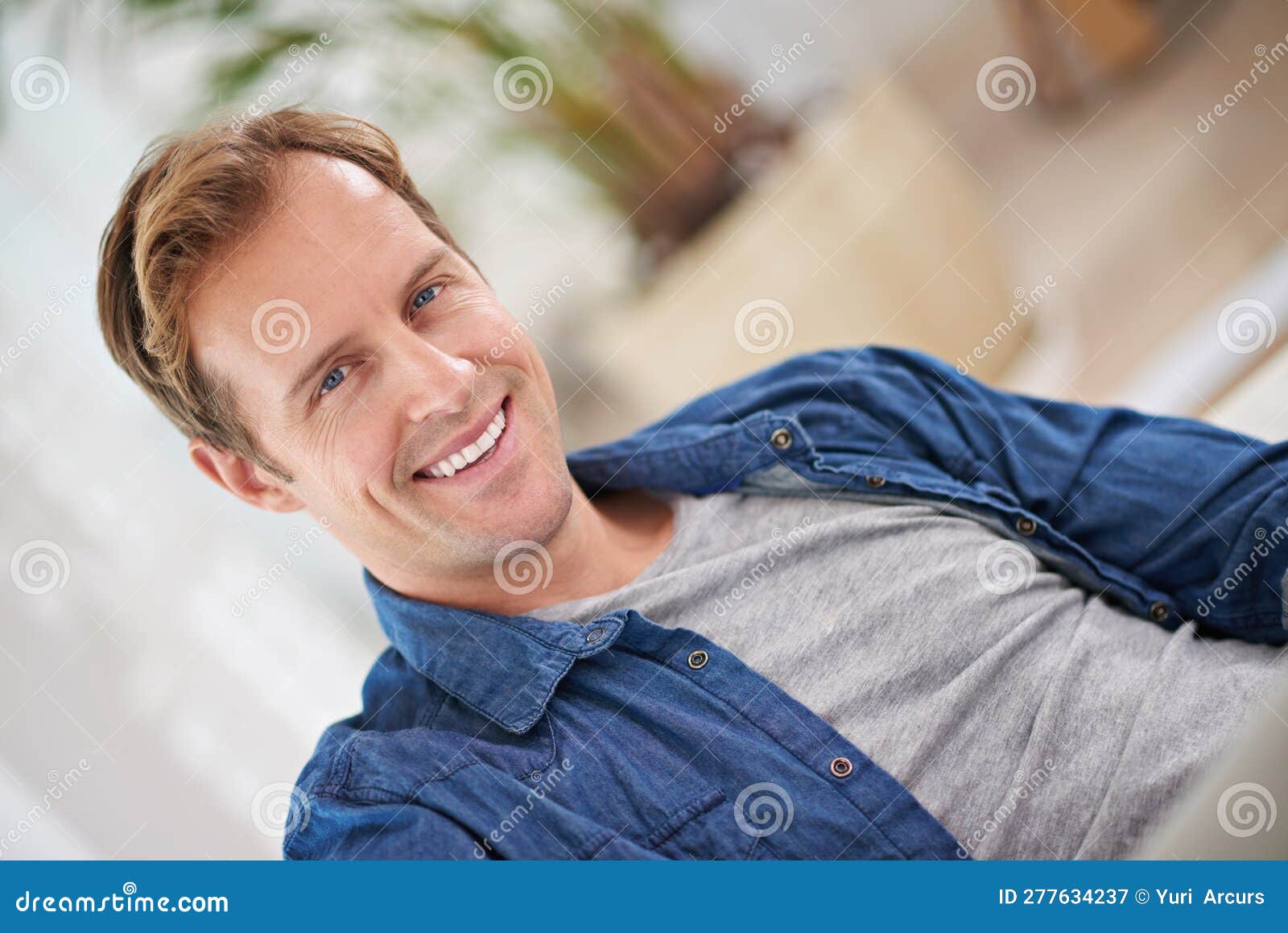 Just Chilling Out. a Handsome Man Relaxing in His Home. Stock Image ...