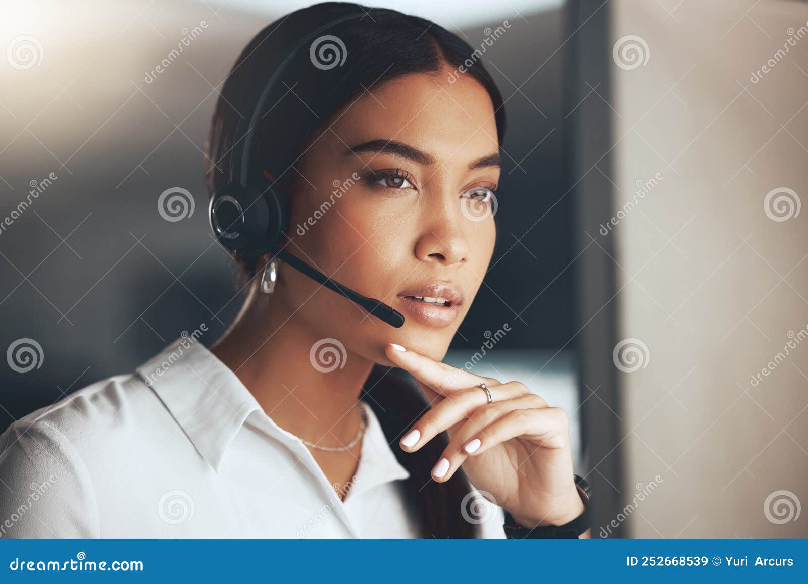 Just Give Me a Moment. a Young Call Centre Agent Sitting Alone in the ...