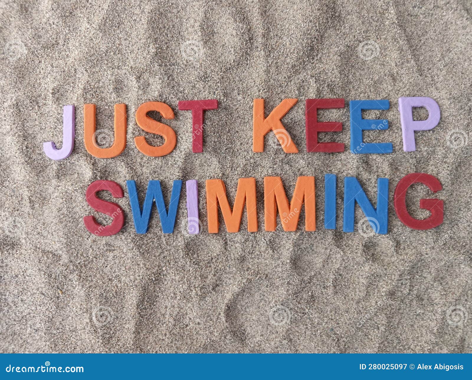 Just Keep Swimming Written on Sand at the Beach Stock Image - Image of ...