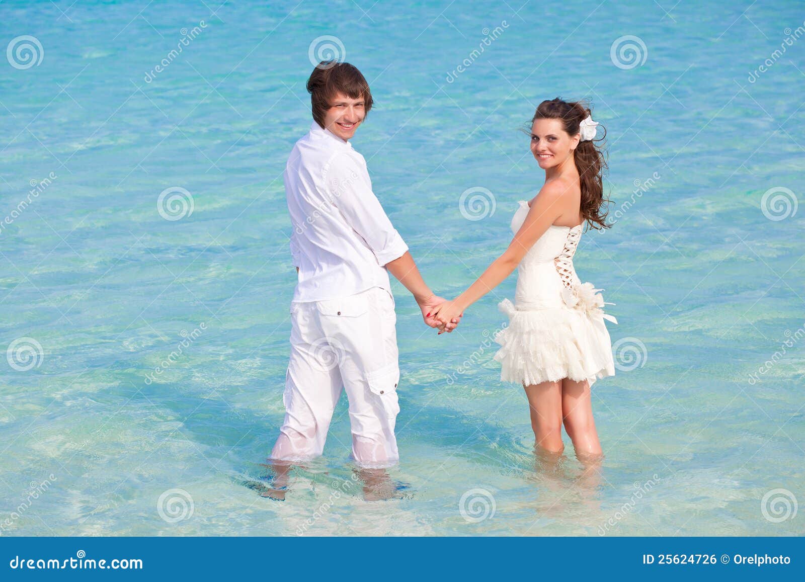 Just Married Couple in the Sea Stock Photo - Image of smiling ...