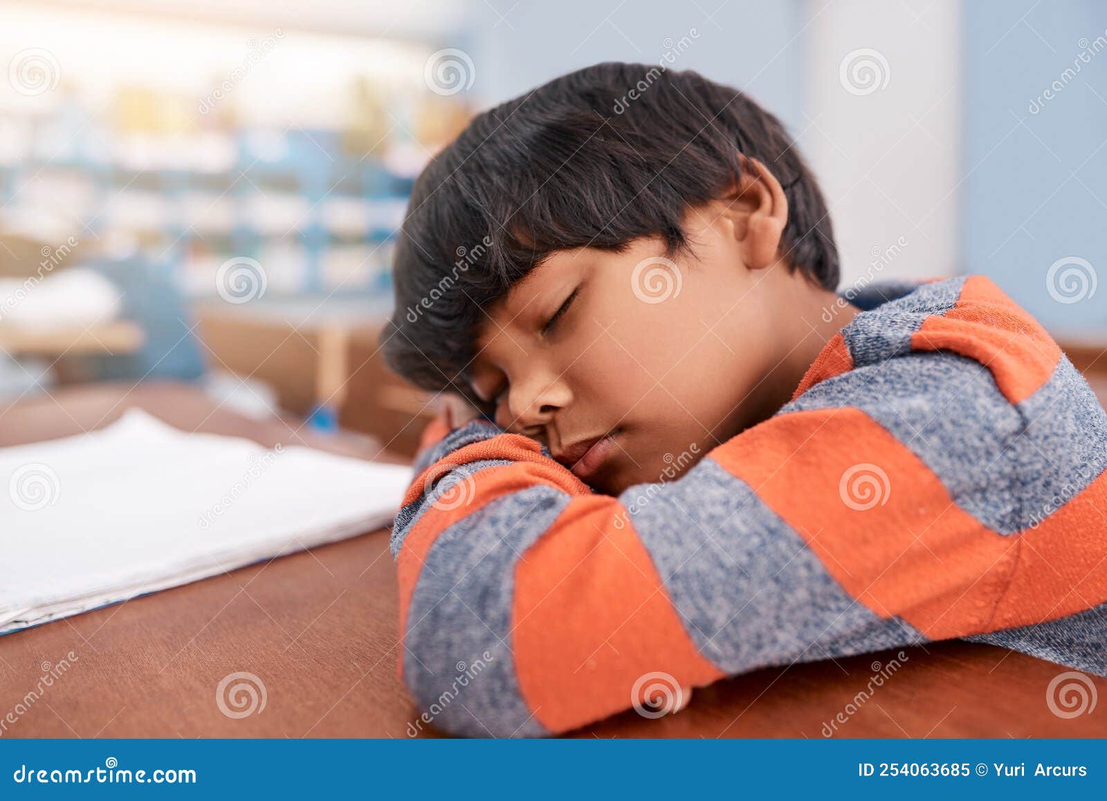 Just a Quick Nap. a Tired Elementary School Child Sleeping on His Desk ...