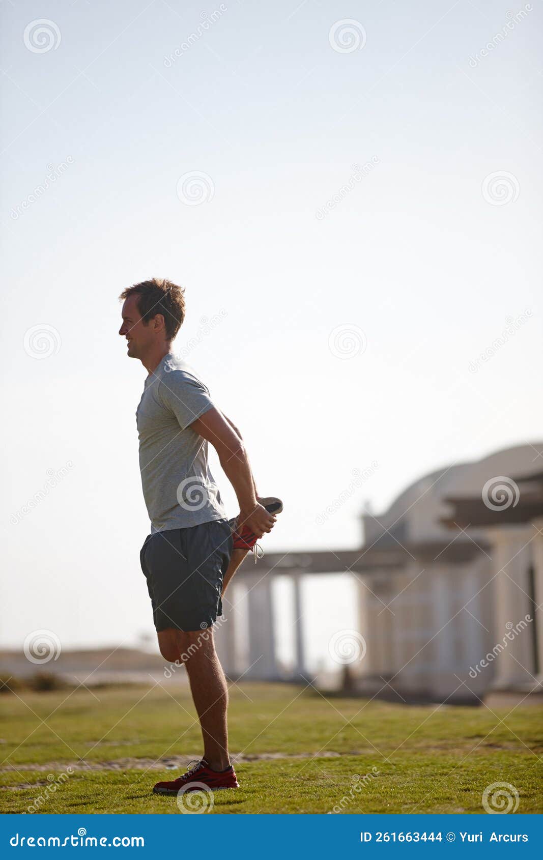 Just a Quick Stretch before His Run. a Man Doing Stretches before His ...