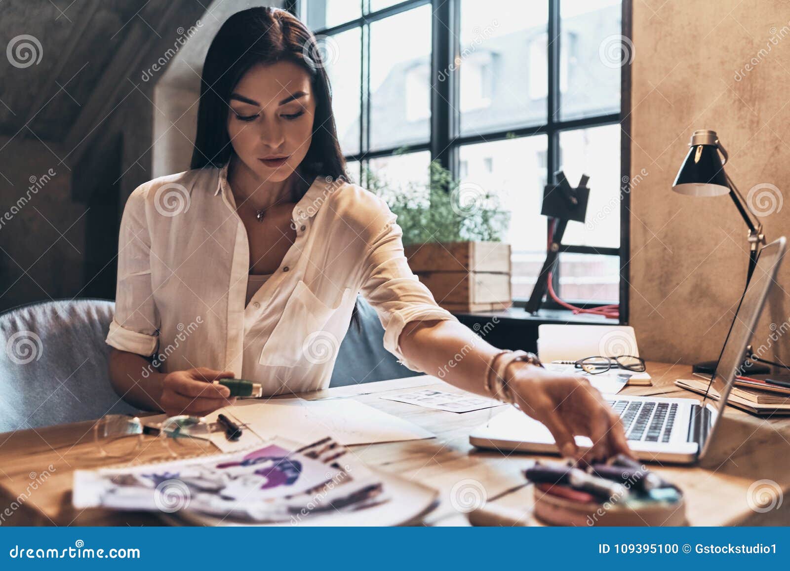 Just Working. Beautiful Young Woman Holding Thread while Sitting Stock ...