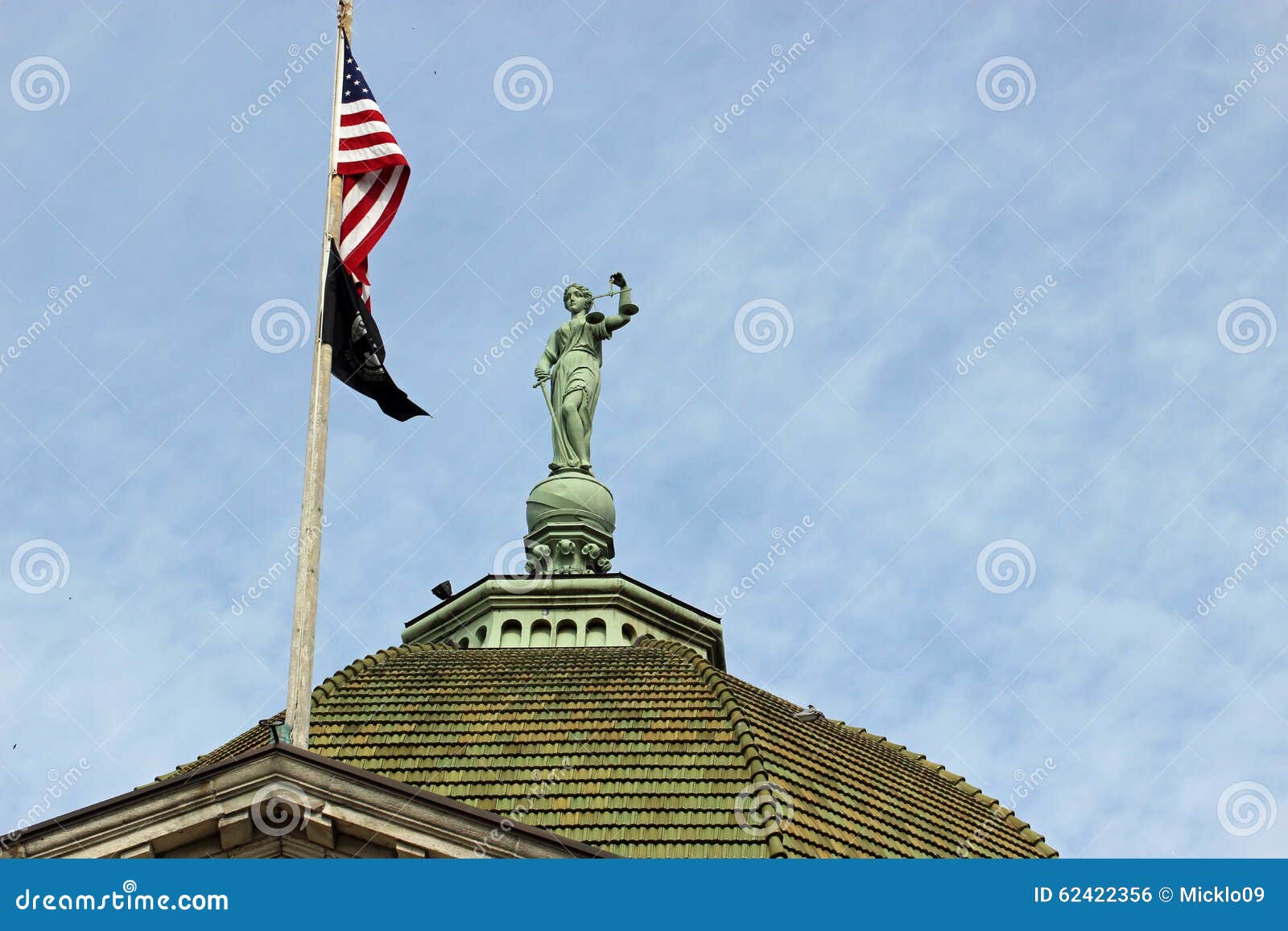 Justice statue and flags stock photo. Image of statue - 62422356