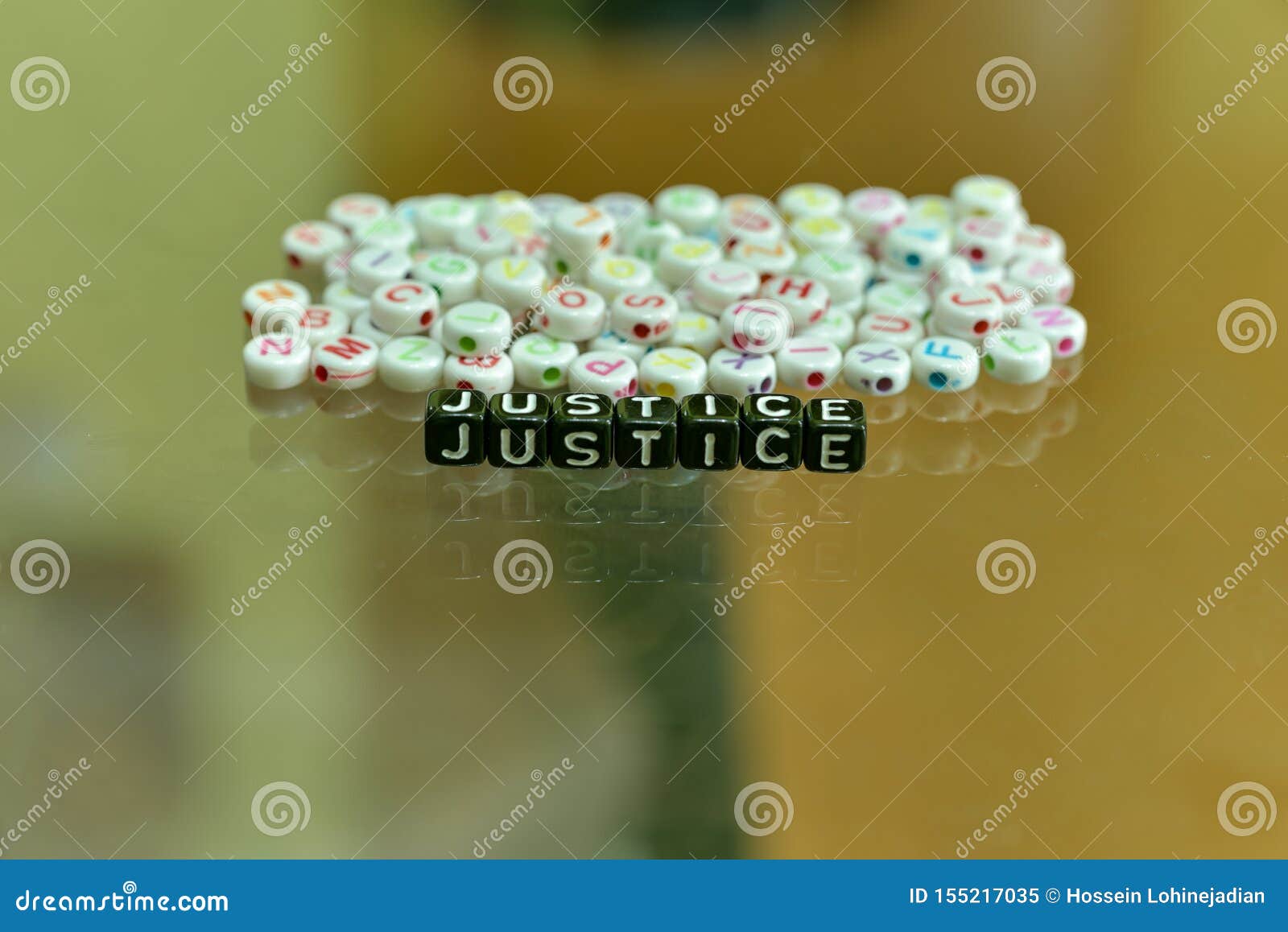 JUSTICE Written with Acrylic Black Cube with White Alphabet Beads on ...