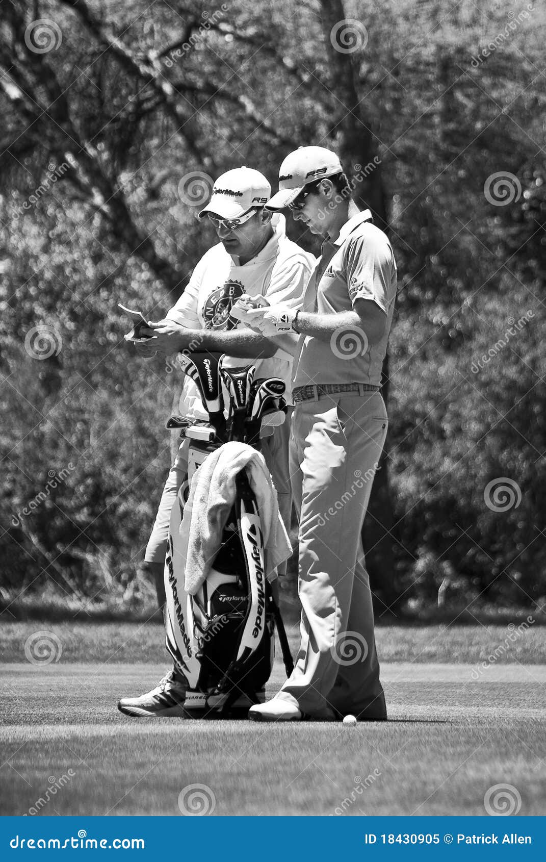 Justin Rose and Caddie editorial image. Image of looking - 18430905