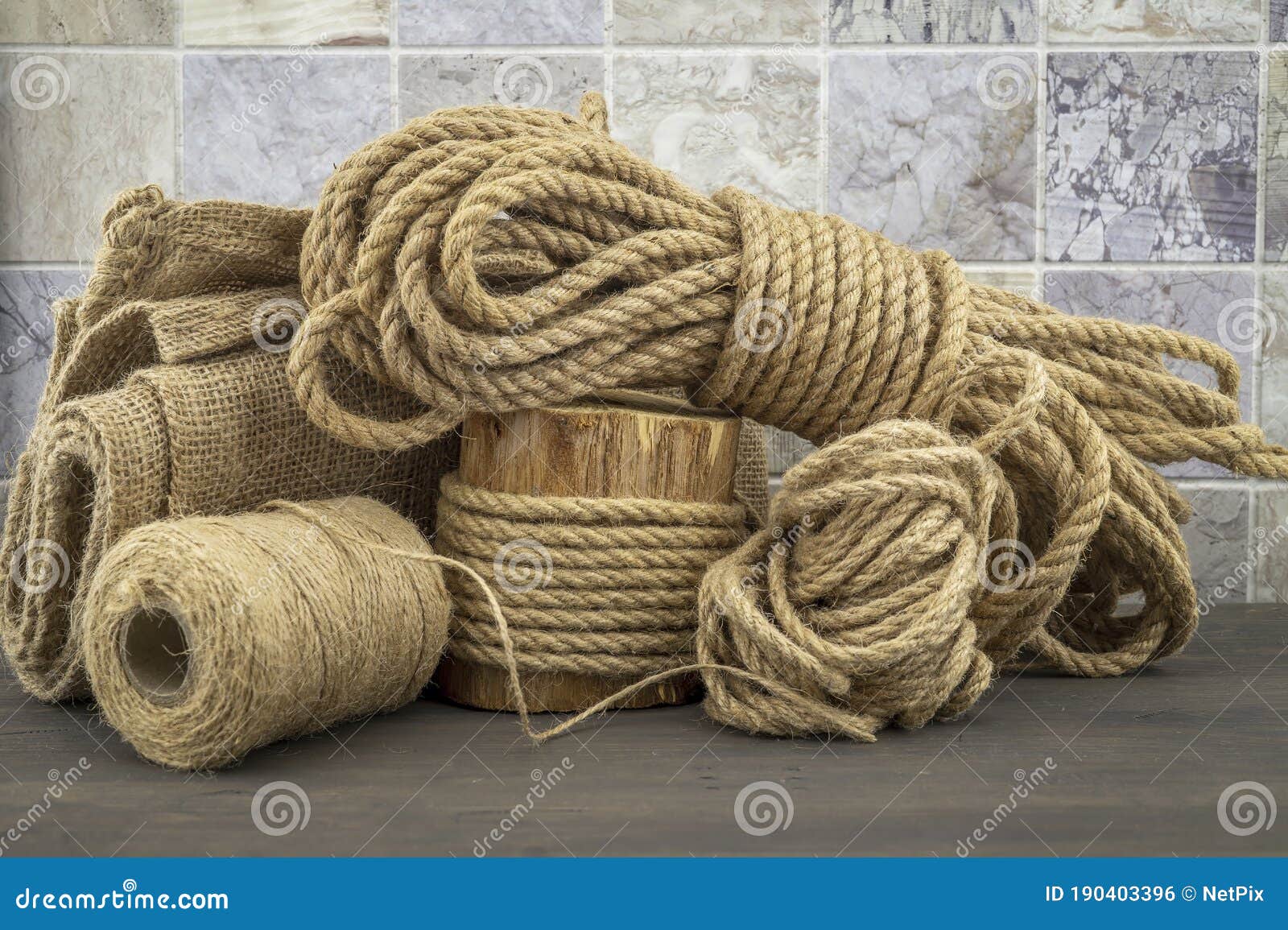 Jute Rope and Spools of Burlap Threads or Twine Stock Photo - Image of ...