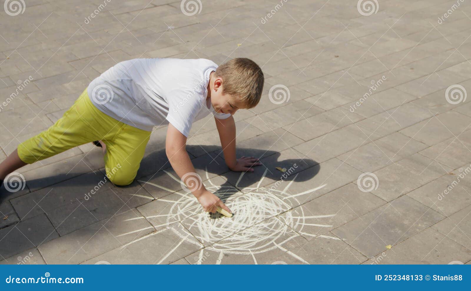 4K. a Boy Draws with Colored Crayons on the Asphalt Stock Image - Image ...