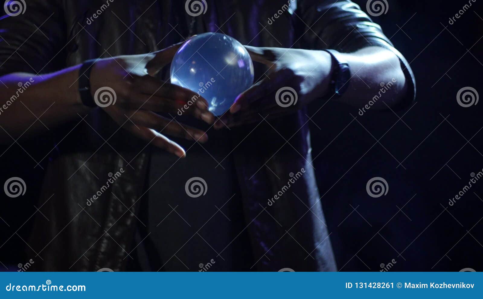 4K Magician Pulls Up a Turning Ball Using Just Fingers Stock Video ...