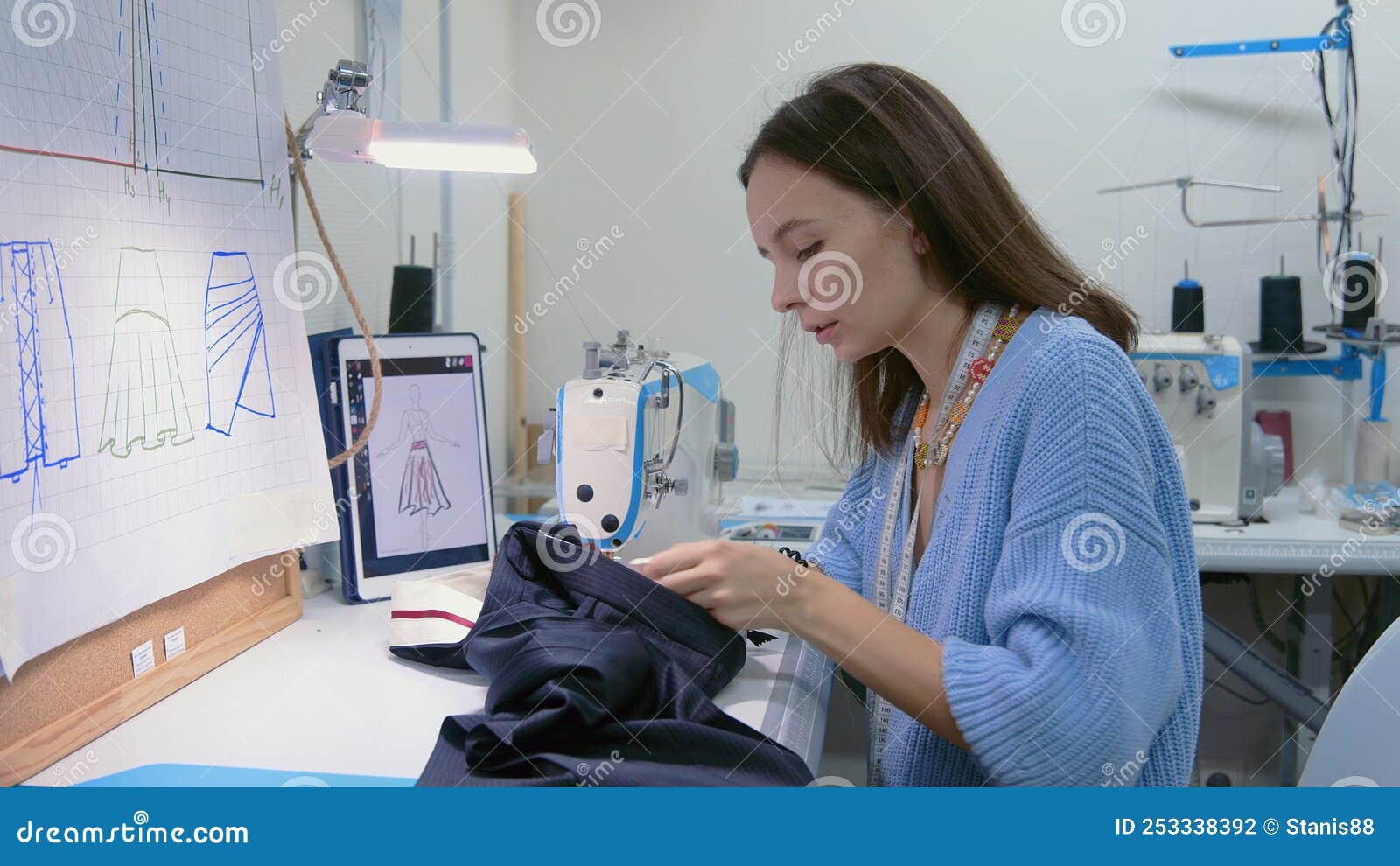 4K. the Master of Sewing Clothes in His Atelier Stock Photo - Image of ...