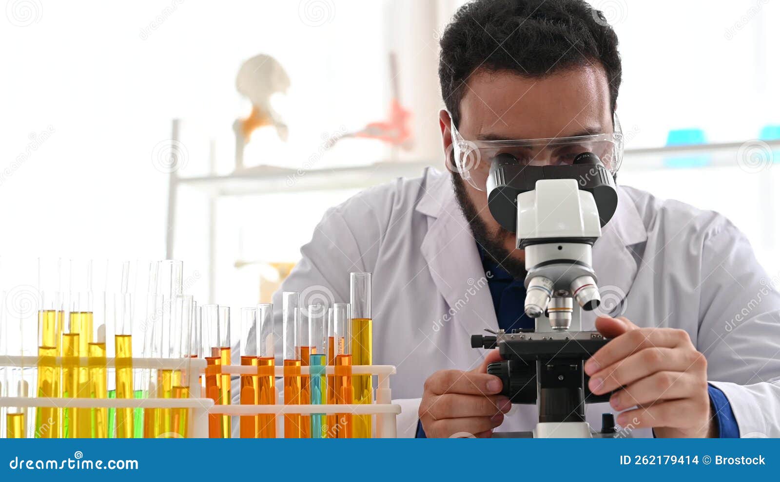 4K Scientist Looking through a Microscope in Laboratory Stock Footage ...