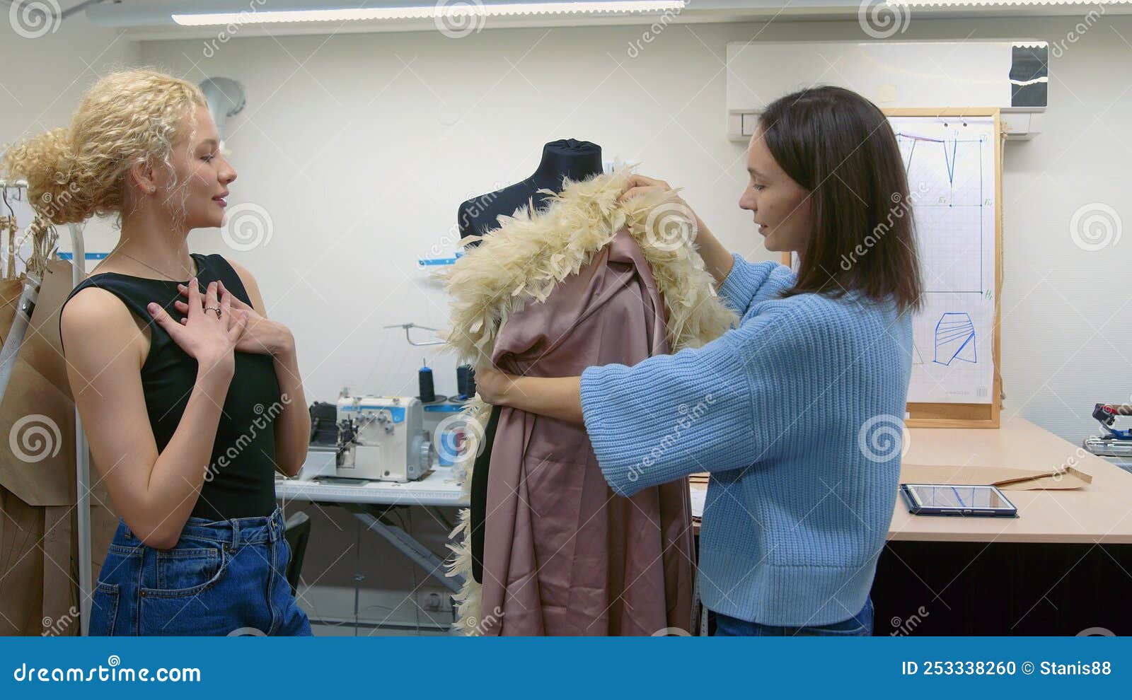 4K. the Seamstress and the Client Measure the Size of the Dress. Stock ...