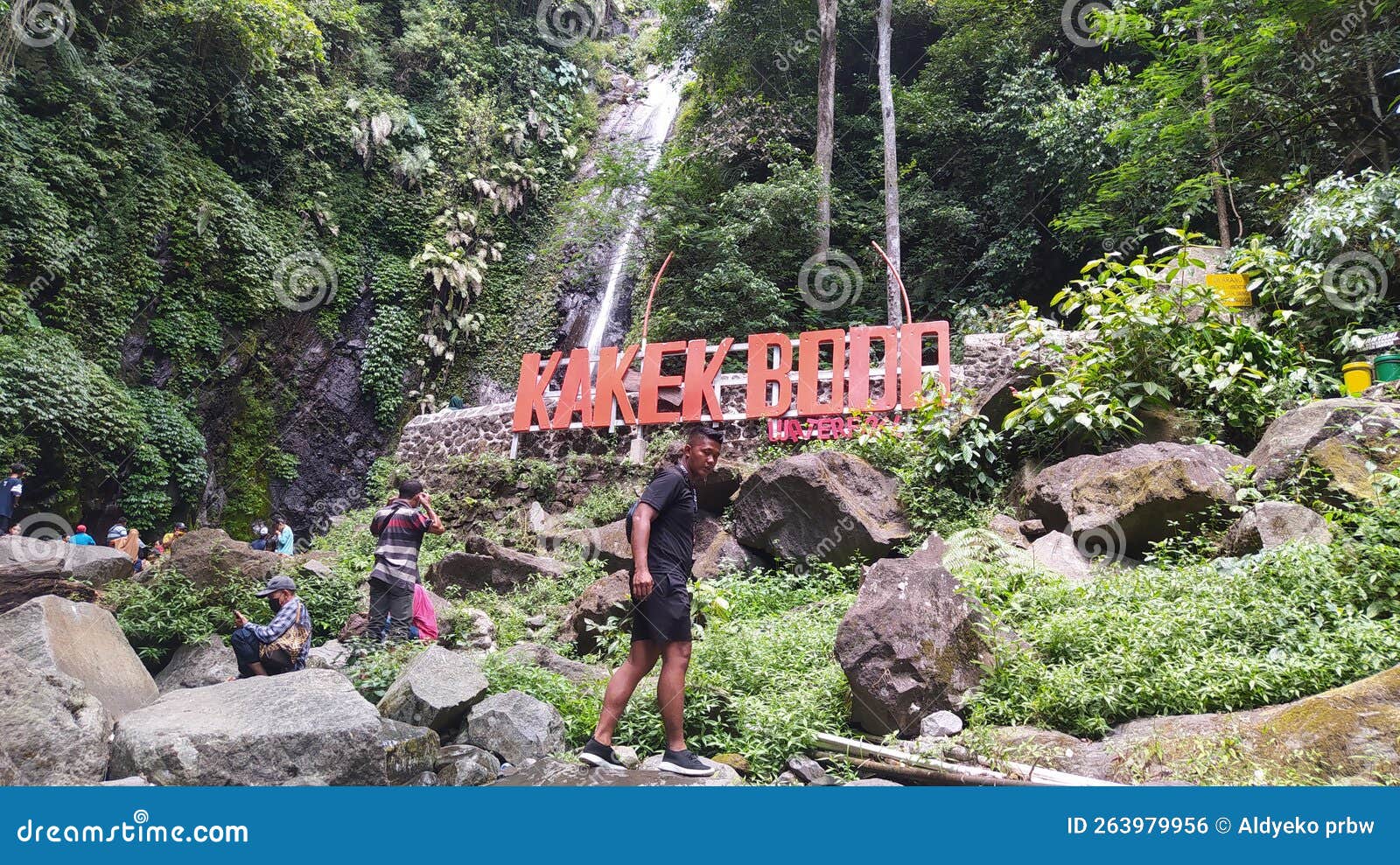 Kakek bodo s waterfall editorial photo. Image of java - 263979956
