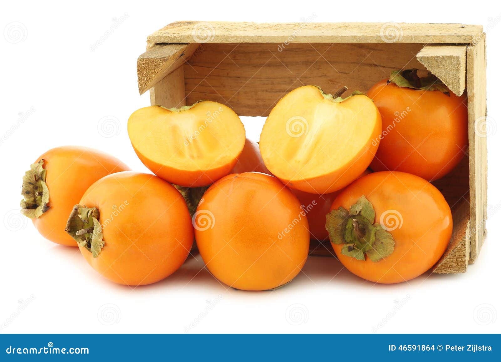 Kaki fruit in a wooden box stock photo. Image of planks - 46591864