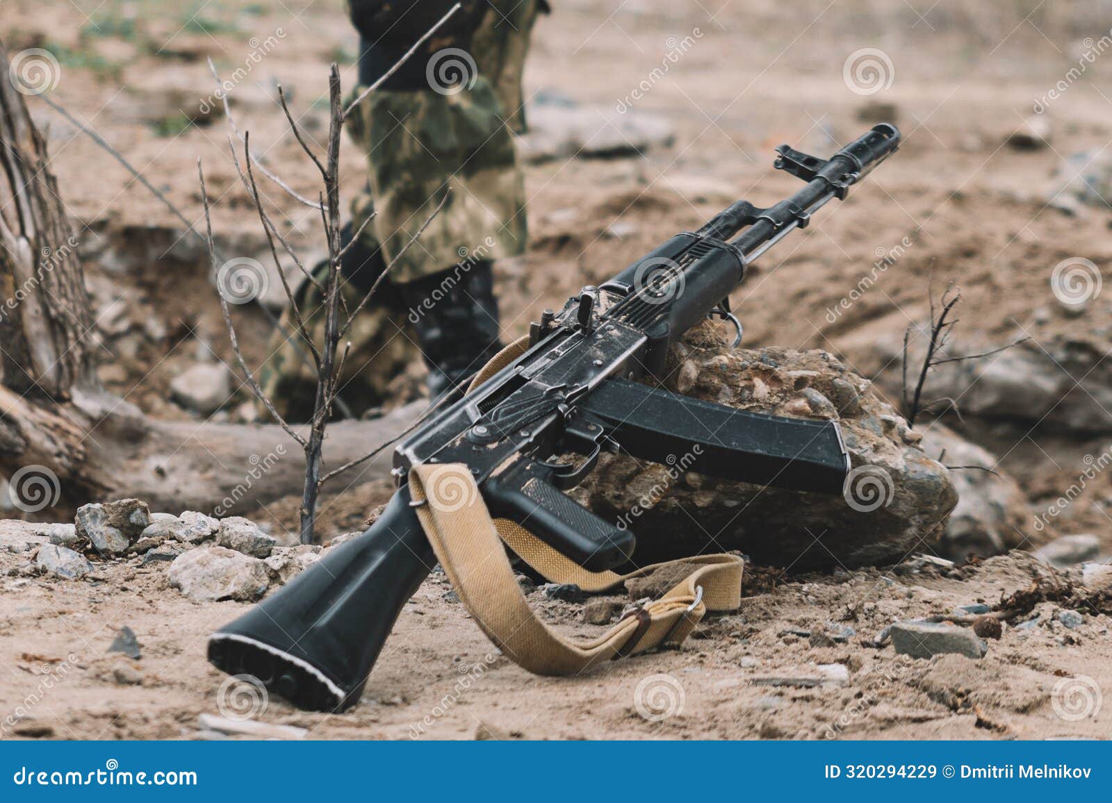 A Kalashnikov Assault Rifle is Lying on Ground. the Concept of War ...