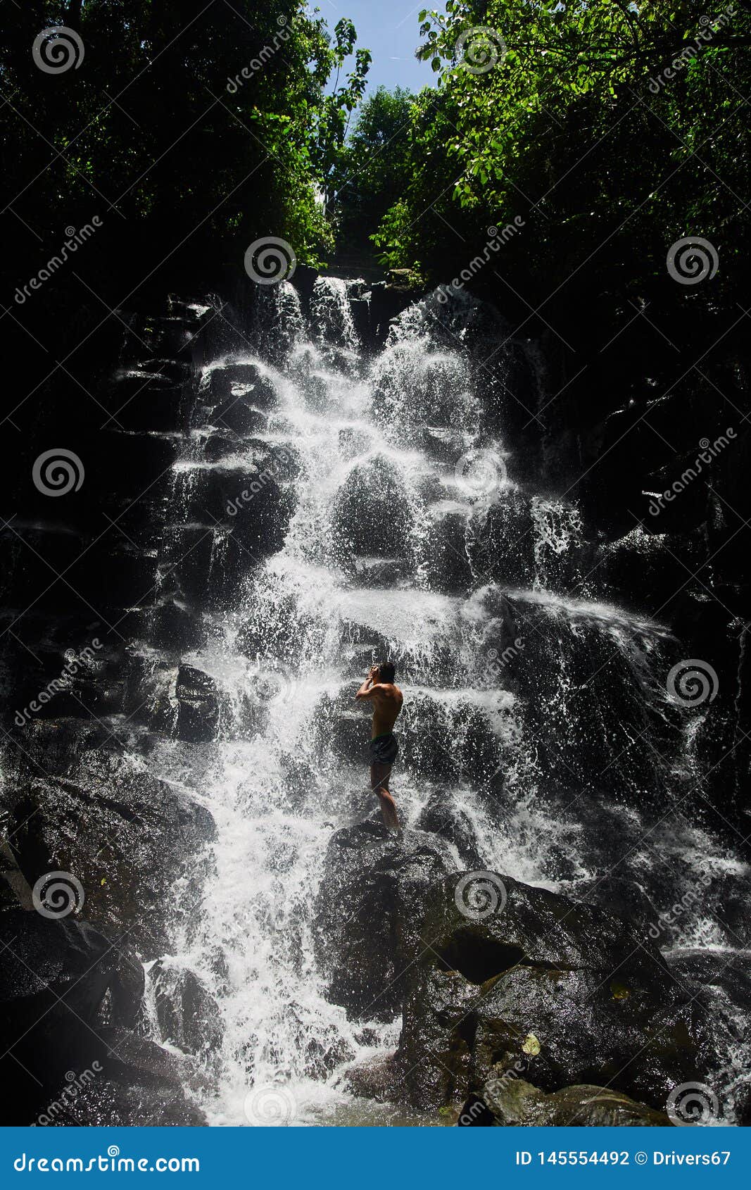 Kanto Lampo Waterfall in Indonesia. Bali. Editorial Photography - Image ...