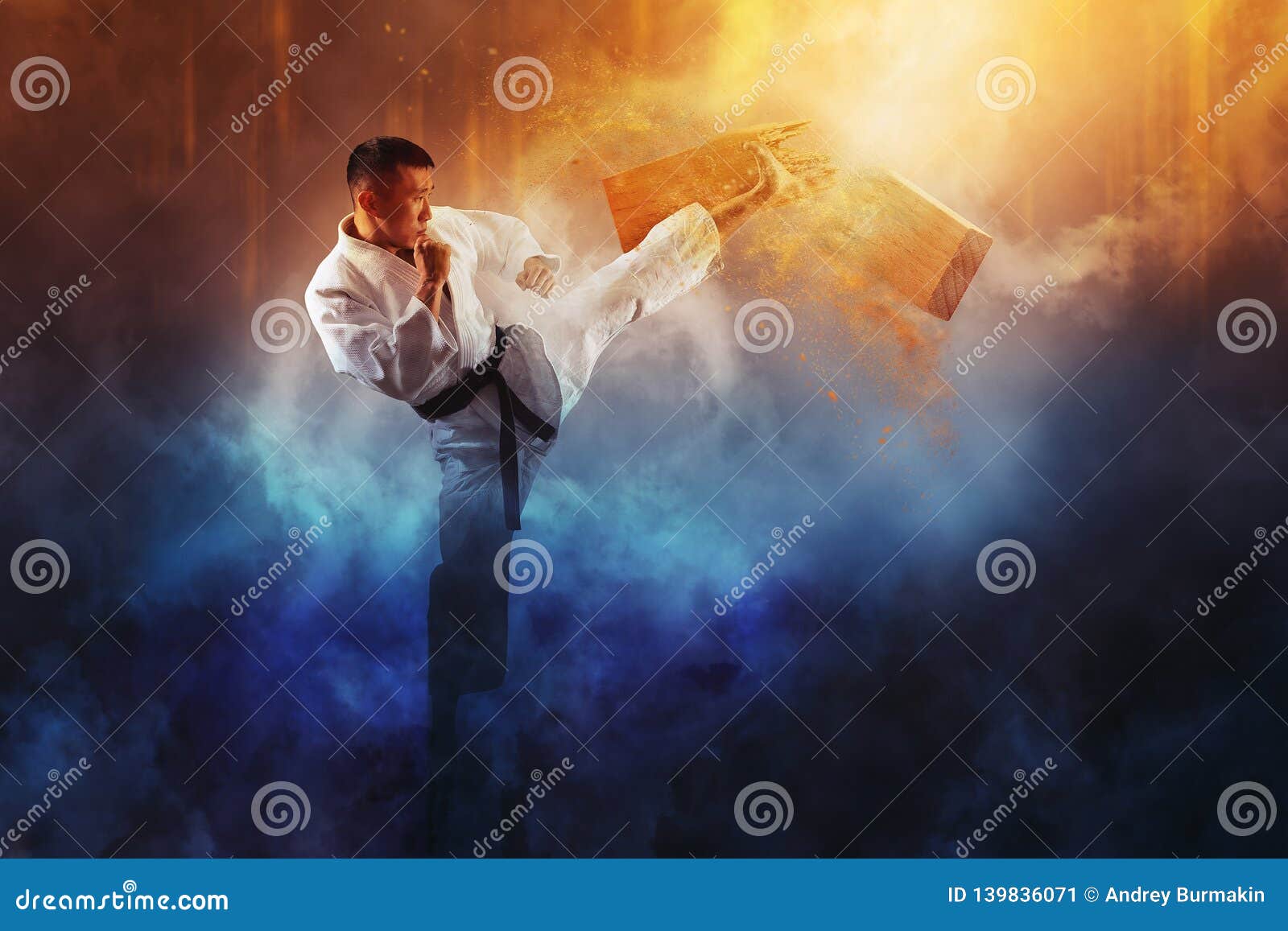 Karate Man Breaking with Leg Wooden Board Stock Image - Image of ...