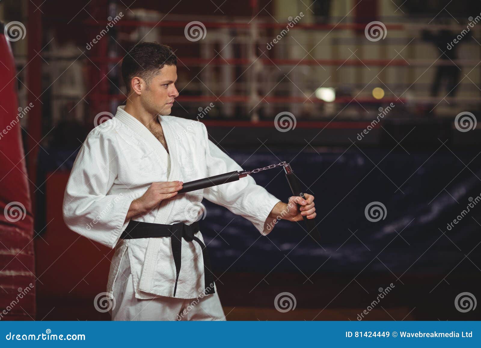 Karate Player Practicing with Nunchaku Stock Image - Image of caucasian ...