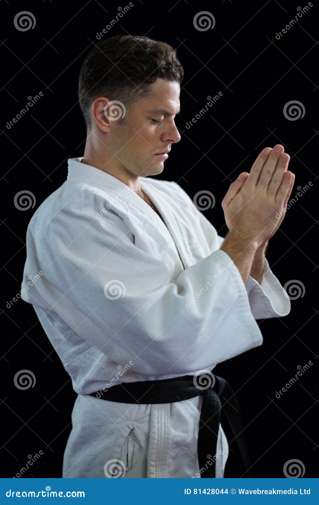 Karate Player in Prayer Pose Stock Photo - Image of accuracy, belt ...