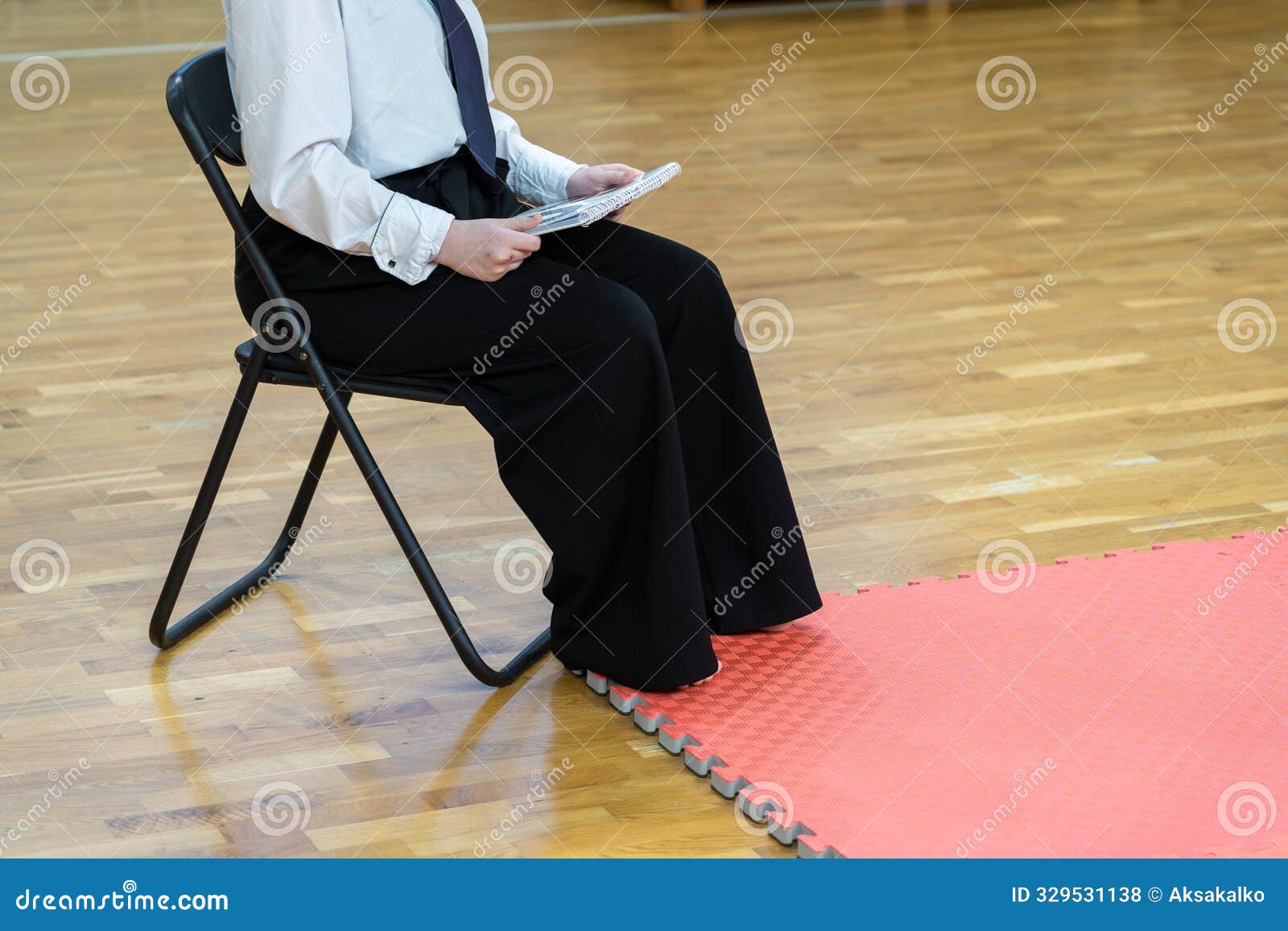 The Karate Referee Sitting beside the Mat Stock Photo - Image of ...