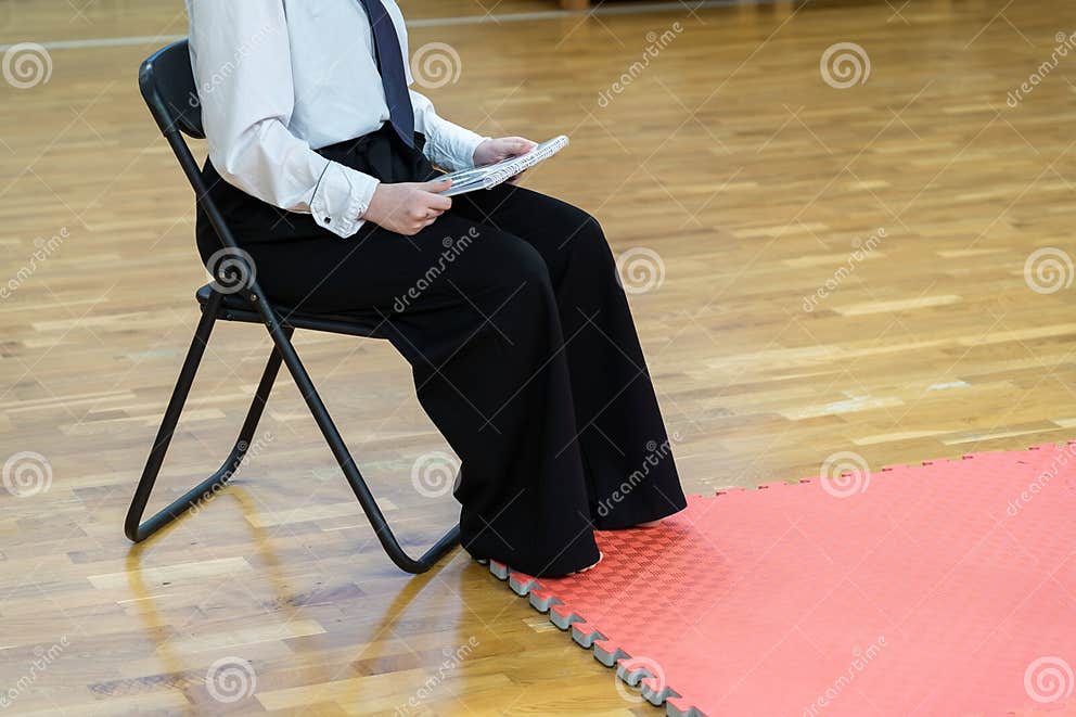 The Karate Referee Sitting beside the Mat Stock Photo - Image of ...